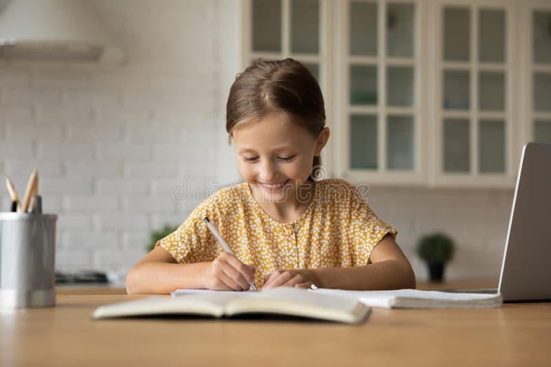 Happy Cute Small Girl Studying on Online Courses. Stock Image - Image ...