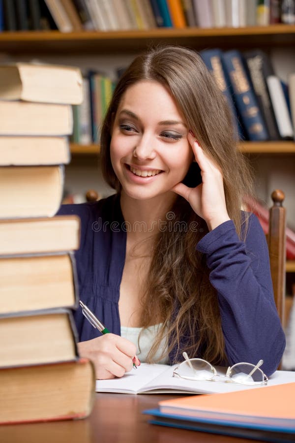 Happy cute young student. stock photo. Image of reading - 29195190