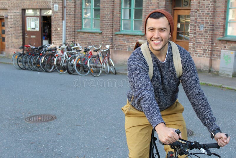 Happy cyclist in the city stock image. Image of bicyclist - 112592003