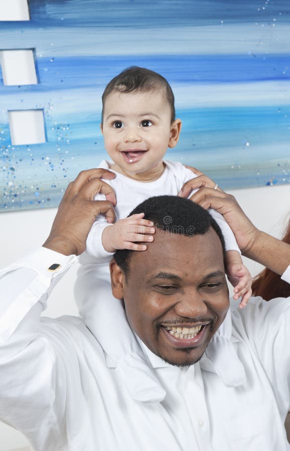 Happy dad and baby boy stock photo. Image of attractive - 25176486
