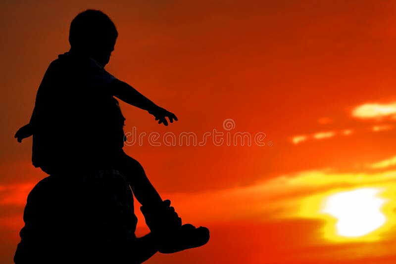 Happy Dad with a Child in the Park Outdoors Silhouette Stock Image ...