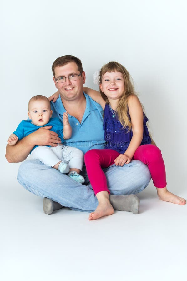 Happy Young Dad Holding on the Hands of Children Stock Image - Image of ...