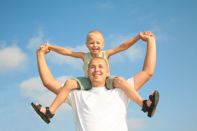 Happy Dad with His Son, Smiling at the Blue Sky Stock Image - Image of ...