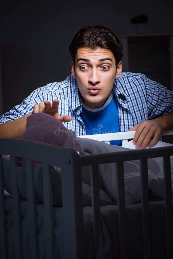 The Happy Dad Looking after Newborn Baby at Night Stock Photo - Image ...
