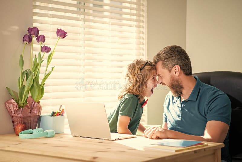 Happy Daddy or Teacher Helping His School Son Kid in Glasses Study with ...