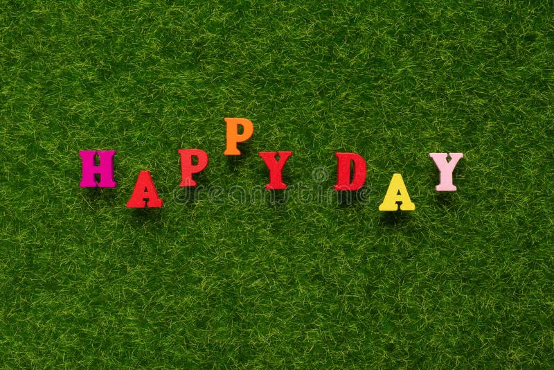 Happy Day Text on a Green Grass Stock Image - Image of wood, letters ...