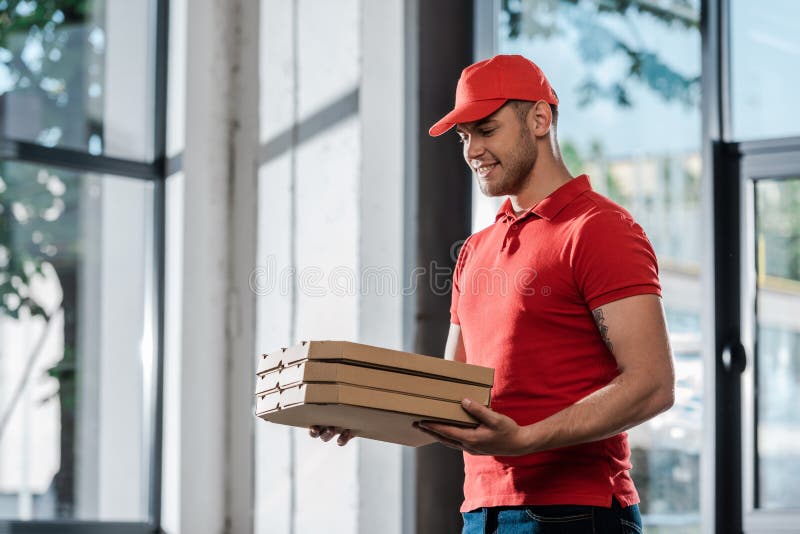 Happy Delivery Man in Cap Looking Stock Image - Image of handsome ...