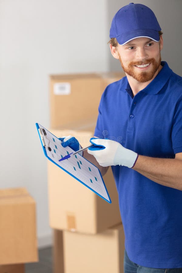 Happy Delivery Man with Cardboard Box Checking List Stock Image - Image ...