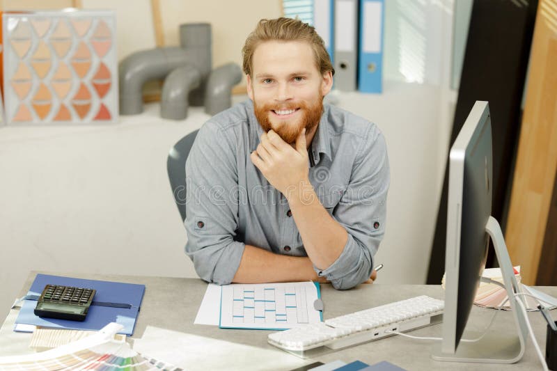 Happy designer in workshop stock image. Image of sketch - 332668105