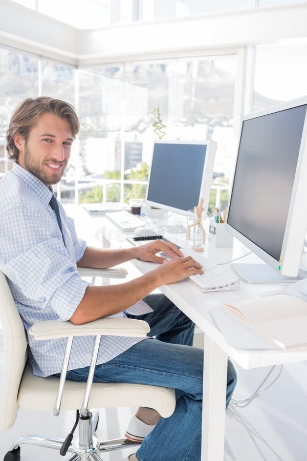 Happy Designer Working at His Desk Stock Photo - Image of mouse, agency ...