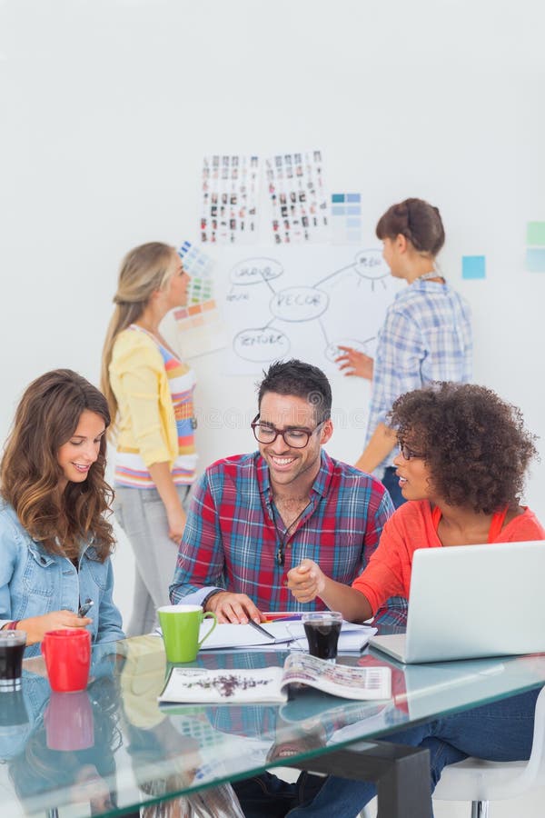 Happy Designers Brainstorming Together Stock Photo - Image of computer ...