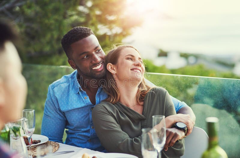 Happy Dinner And Interracial Couple Hug Outdoor With Love Care And