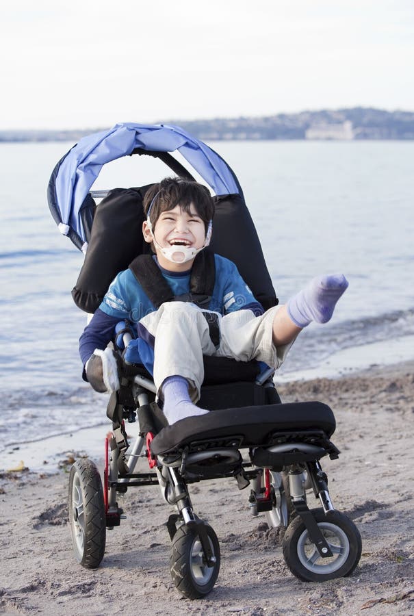 Happy Disabled Boy in Wheelchair on the Beach Stock Image - Image of ...