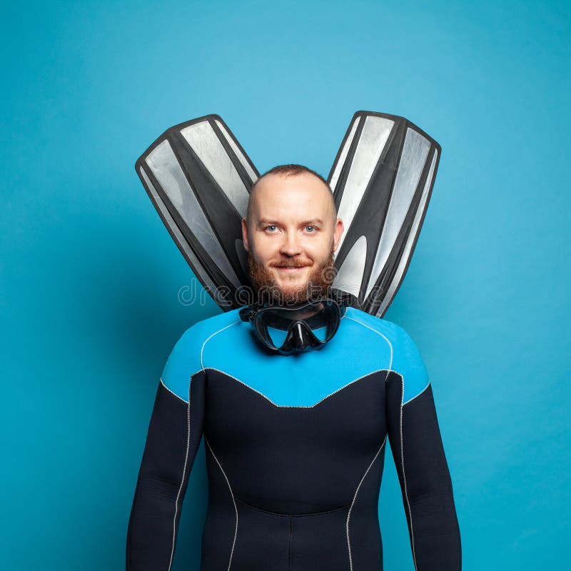 Happy Diver Diving Man with Flippers Smiling Against Bright Blue Studio ...
