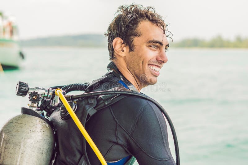 Happy Diver Returns To the Ship after Diving Stock Photo - Image of ...