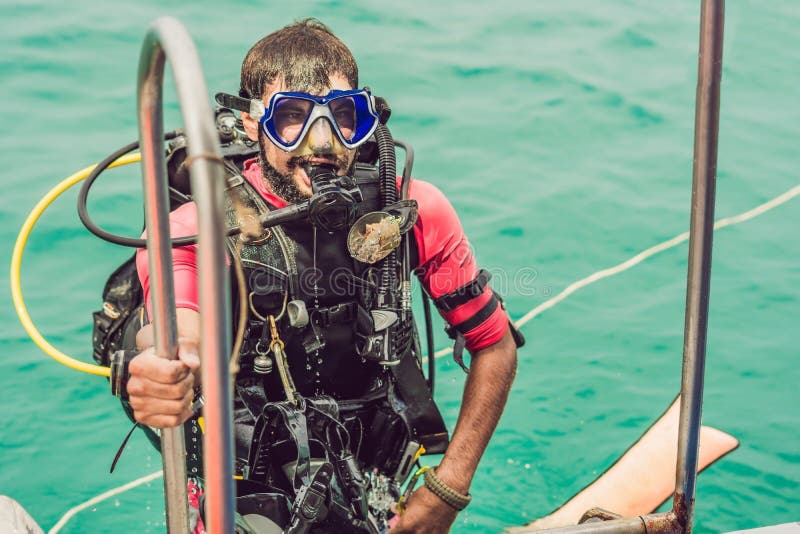 Happy Diver Returns To the Ship after Diving Stock Photo - Image of ...