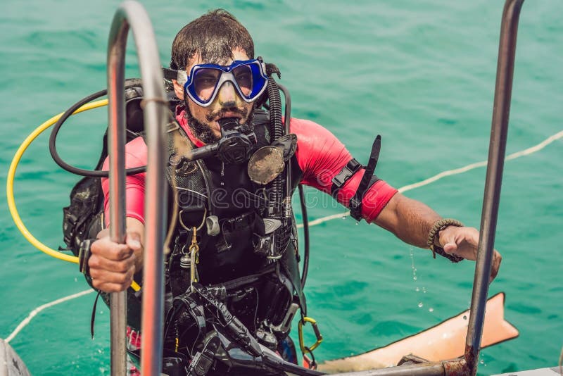 Happy Diver Returns To the Ship after Diving Stock Image - Image of ...