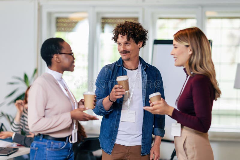 Diverse Colleagues Have Fun At Lunch Break In Office Smiling