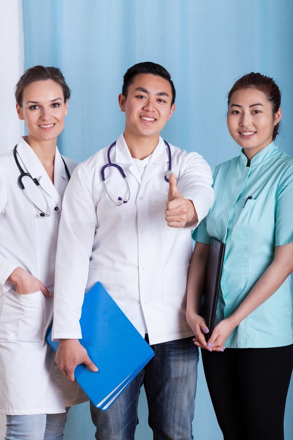 Happy diverse doctors stock photo. Image of mongolian - 45221322