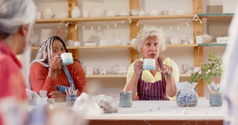 Happy Diverse Group of Potters Having Break and Discussing in Pottery ...