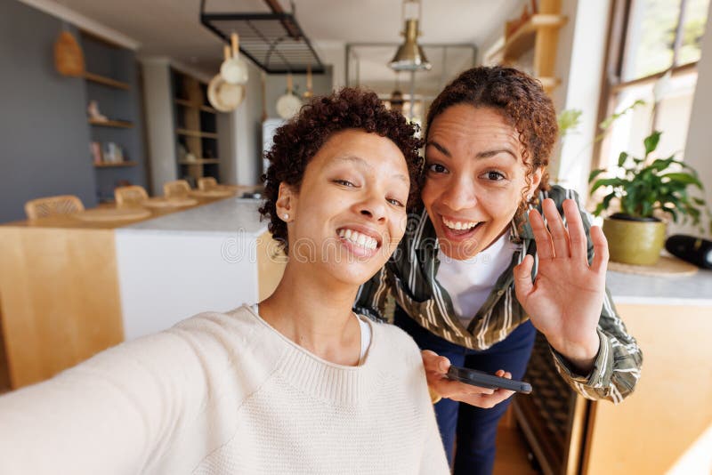 Happy Diverse Lesbian Couple Having Video Call Stock Image Image Of