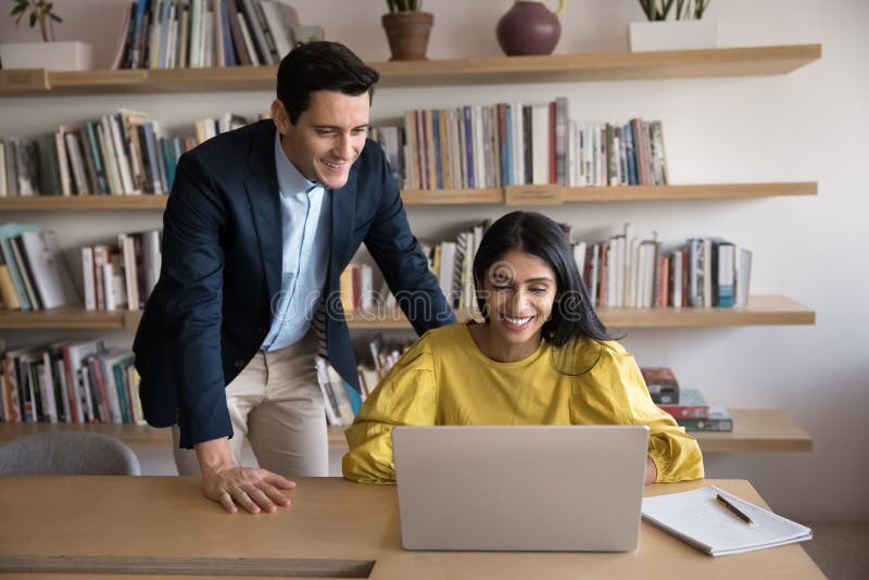 Happy Diverse Student and Tutor Working in Library Stock Photo - Image ...