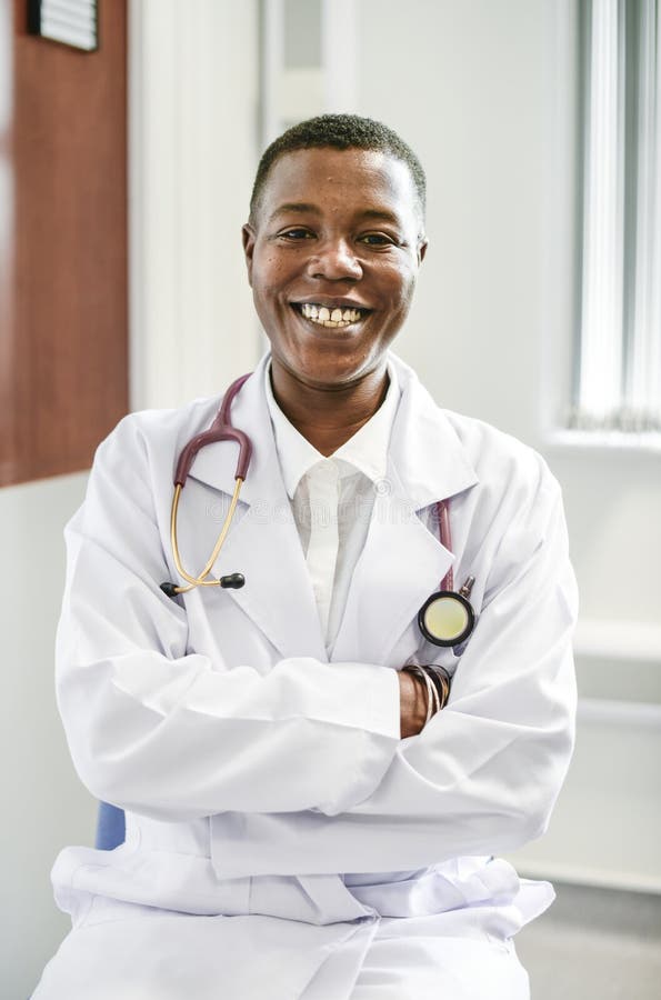 Happy doctor at a hospital stock image. Image of healthcare - 130819181