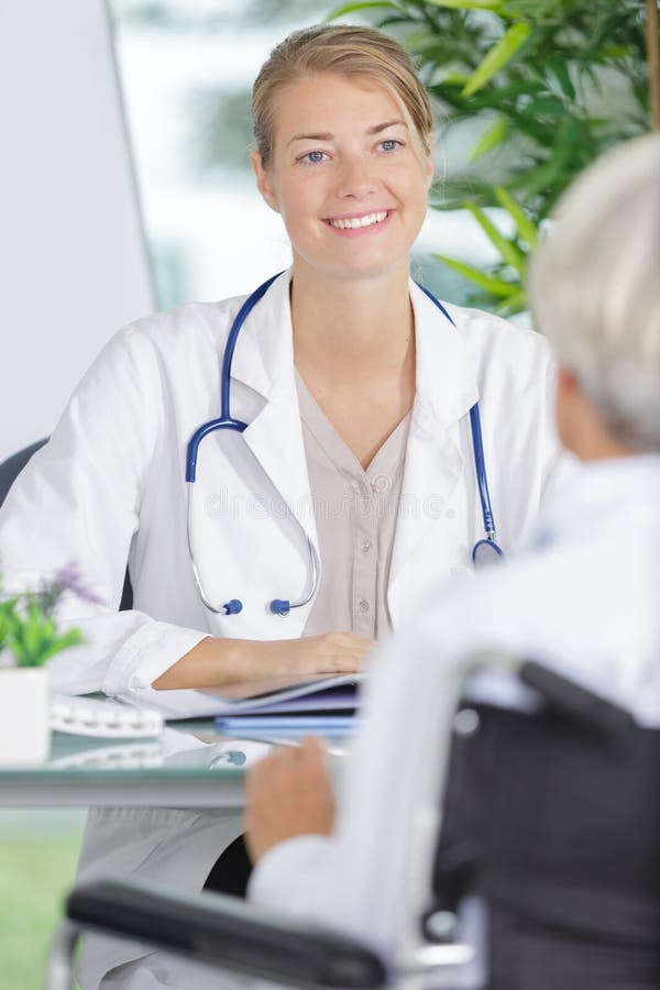 Happy doctor in office stock photo. Image of occupation - 281402994