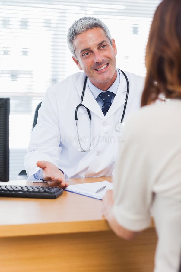 Happy Doctor Talking with His Patient Stock Image - Image of listening ...