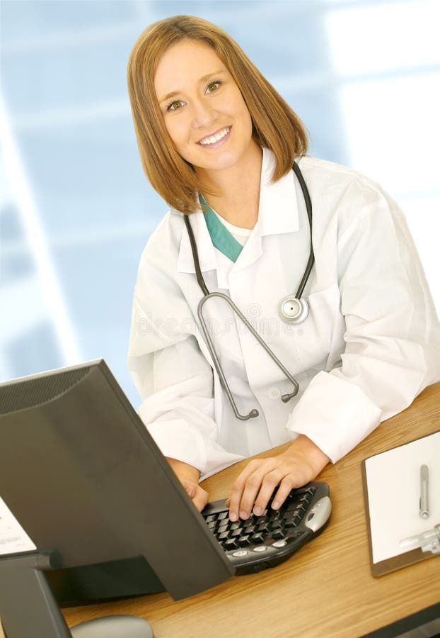 Happy Doctor Typing and Look at Camera Stock Image - Image of physician ...