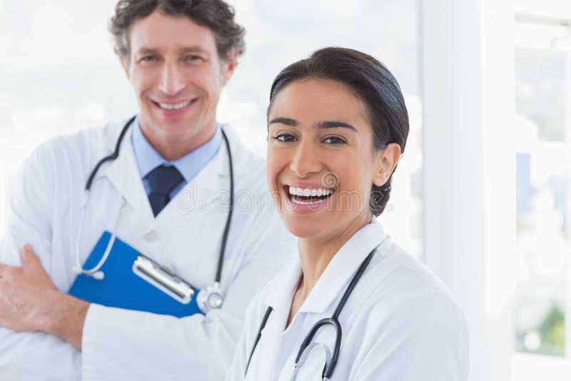 Happy Doctors Looking at Camera Stock Image - Image of male, medicine ...