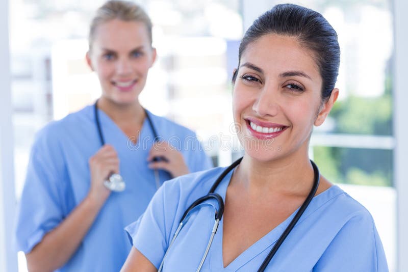 Happy Doctors Looking at Camera Stock Image - Image of nurse ...