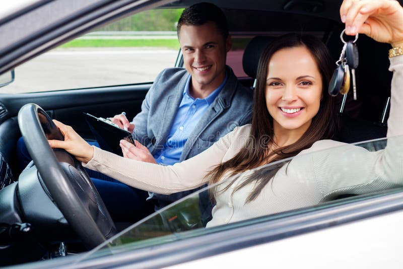 Driving Instructor and Woman Student Stock Photo - Image of ...