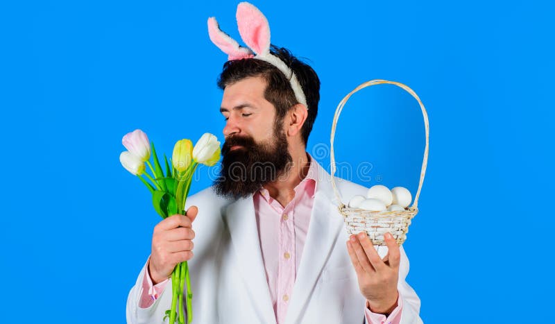 Happy Easter. Bearded Man with Bunny Ears with Basket Eggs and Bouquet ...