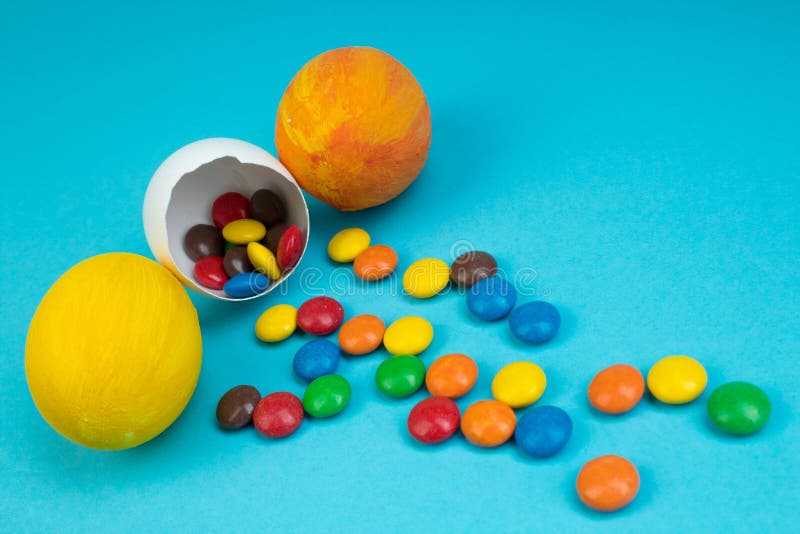 Happy Easter. Broken Easter Egg with Multi-colored Candy Decorations on ...