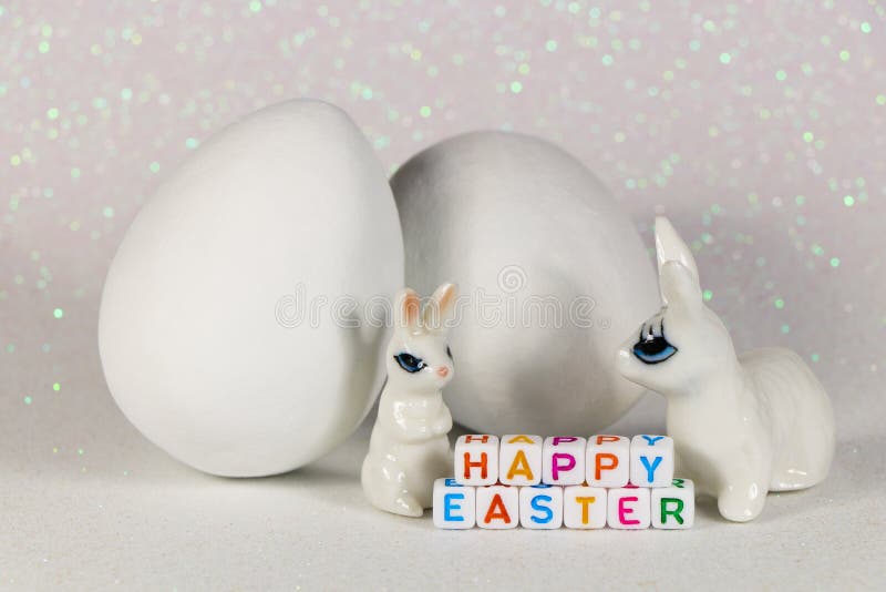 Happy Easter Bunnies with Large White Eggs Stock Photo - Image of ...