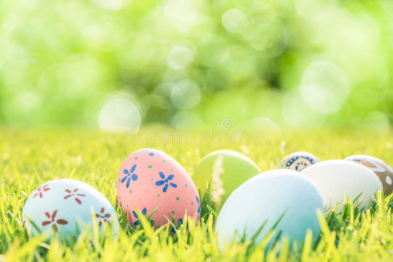 Happy Easter! Closeup Colorful Easter Eggs on Green Grass Field Stock ...