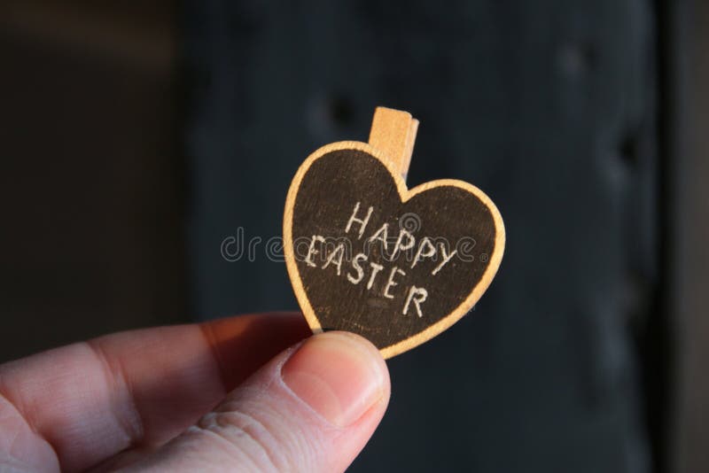 Happy Easter Concept. the Hand Holds a Heart with the Inscription ...
