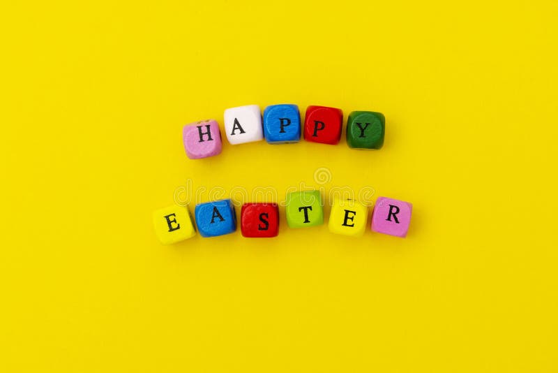 Happy Easter. Cubes with Text on Yellow Background Stock Photo - Image ...