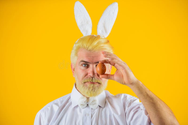 Happy Easter Day. Bearded Man in Rabbit Ears with Easter Egg. Bunny ...