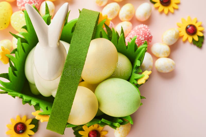 Happy Easter. Easter Eggs and Rabbit in Green Basket on Pink Background ...
