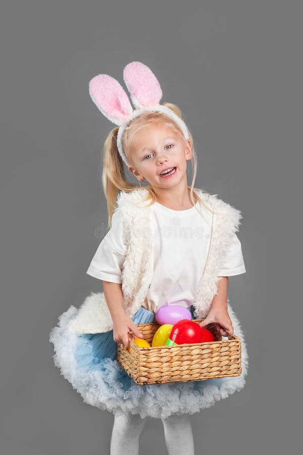 Happy Easter. Girl with Basket for Easter Eggs and Rabbit Ears Stock ...