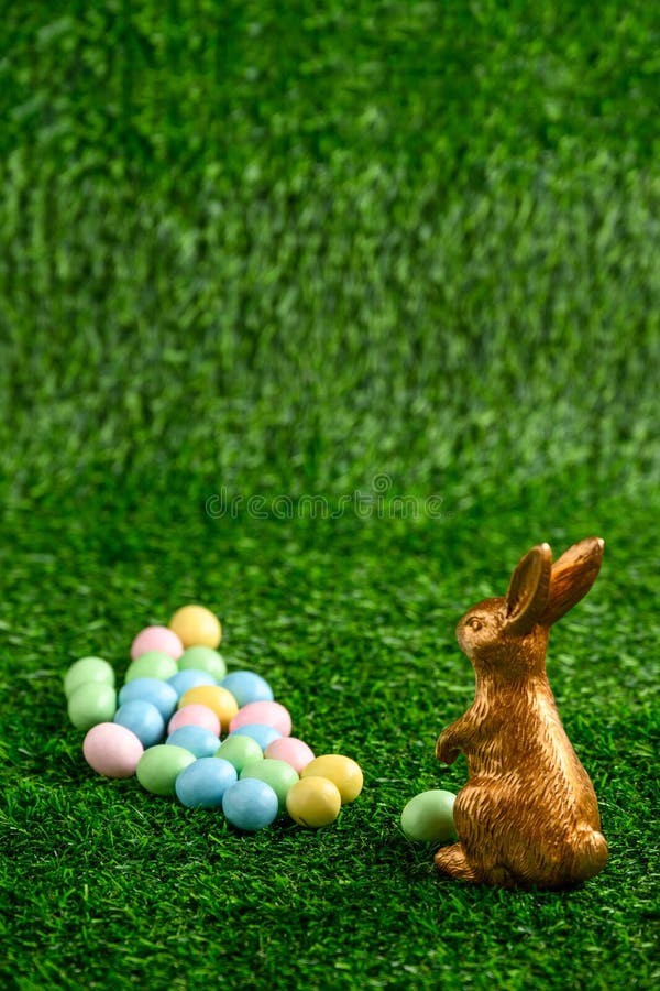 Happy Easter, Gold Easter Bunny and Pastel Colored Candy Coated Easter ...