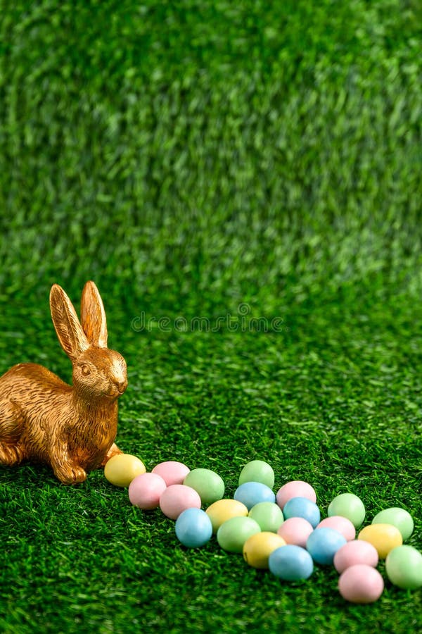 Happy Easter, Gold Easter Bunny and Pastel Colored Candy Coated Easter ...