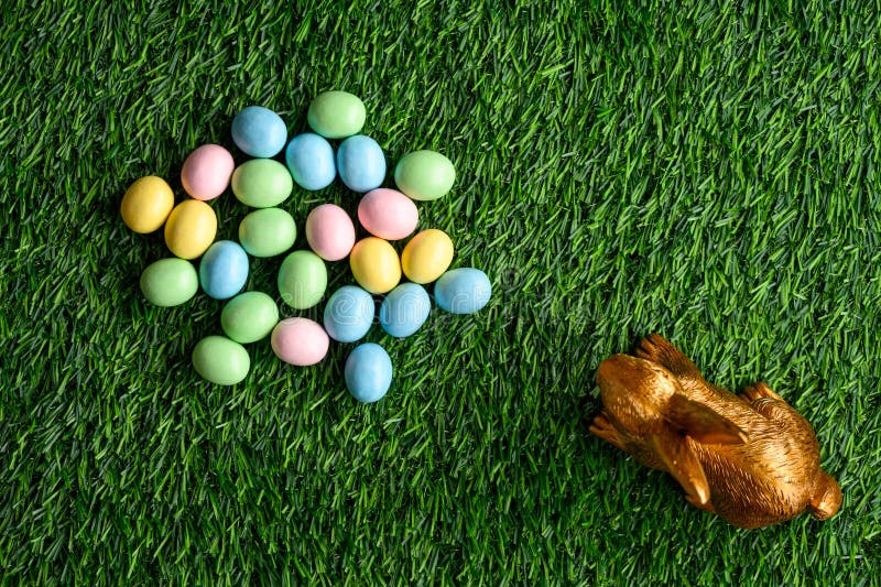 Happy Easter, Gold Easter Bunny and Pastel Colored Candy Coated Easter ...