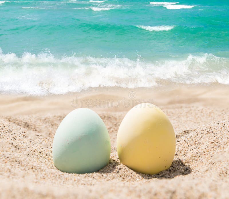 Happy Easter Background with Eggs on the Sandy Beach Stock Photo ...