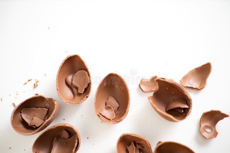 Happy Easter. Open Broken Destroyed Crumbled Chocolate Eggs on a White ...