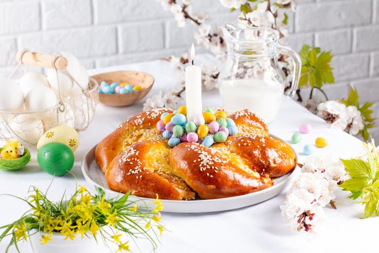 Happy Easter. Sweet Easter Bread with Colored Eggs and Flowers Stock ...