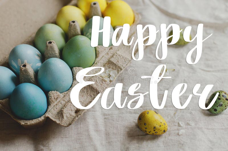 Happy Easter Text Sign on Easter Eggs and Blooming Cherry Branch on ...