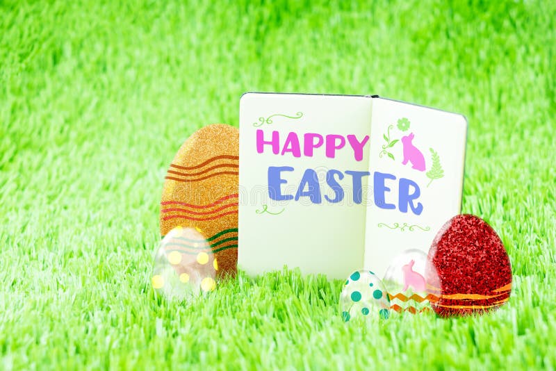 Happy Easter Word on Open Notebook on Green Grass with Colorful Stock ...